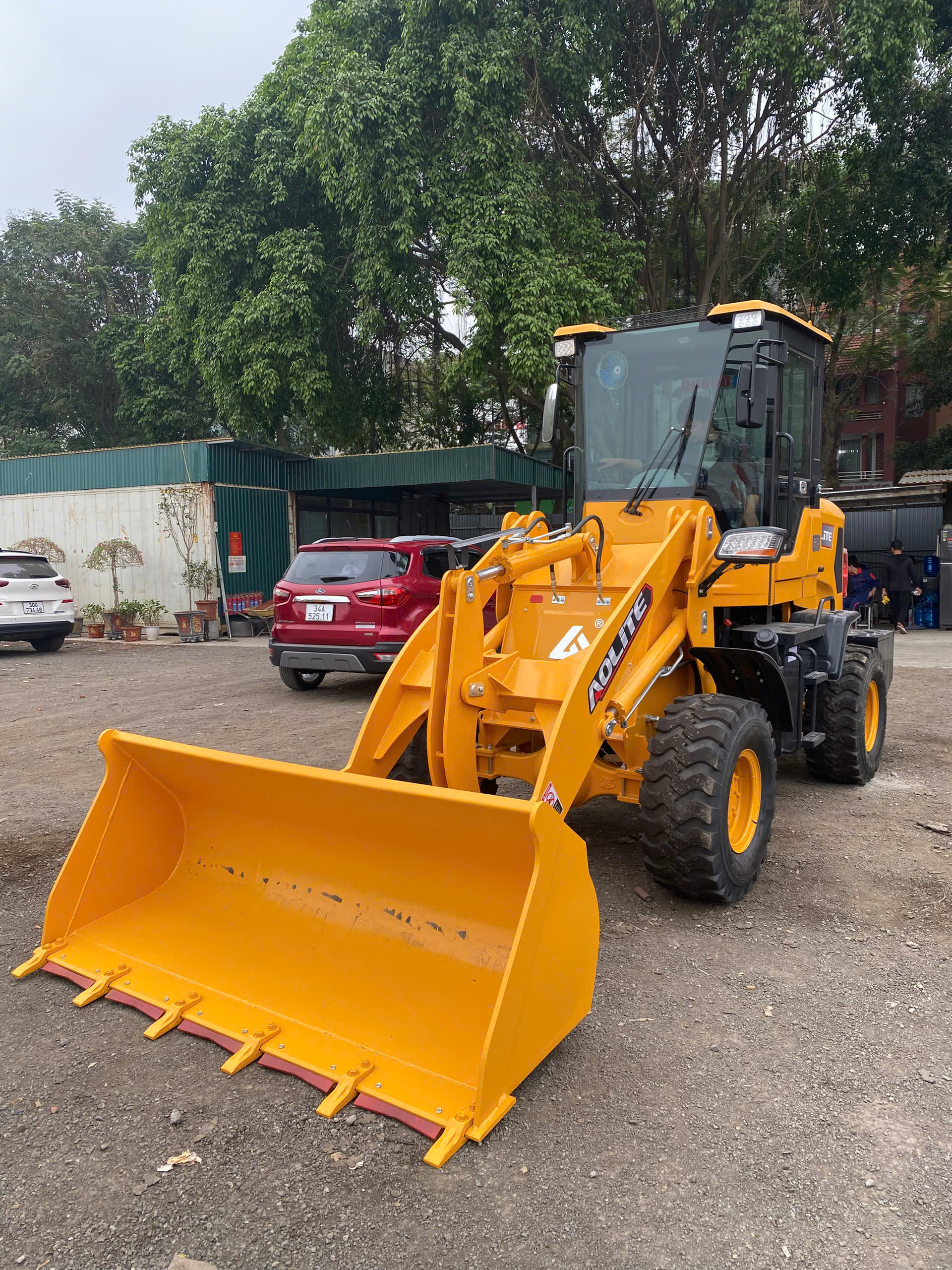 Máy xúc lật AOLITE 930T gầu 0,9 m3 - Máy Đông Dương